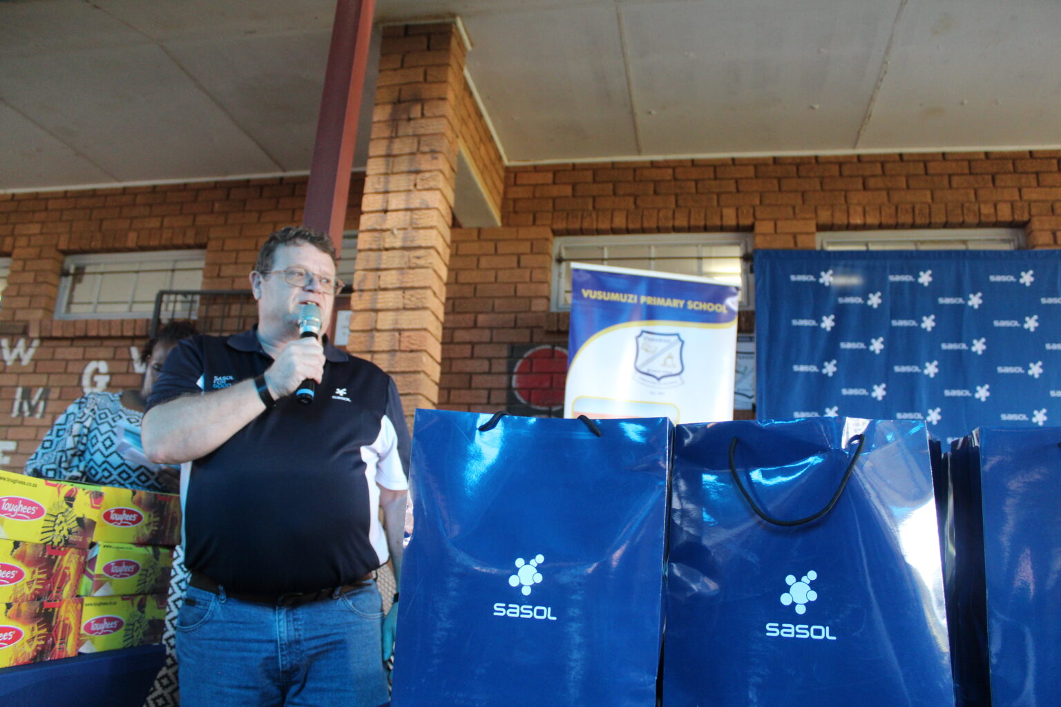 Empowering Communities Through Education and Health Support - Sasol in ...